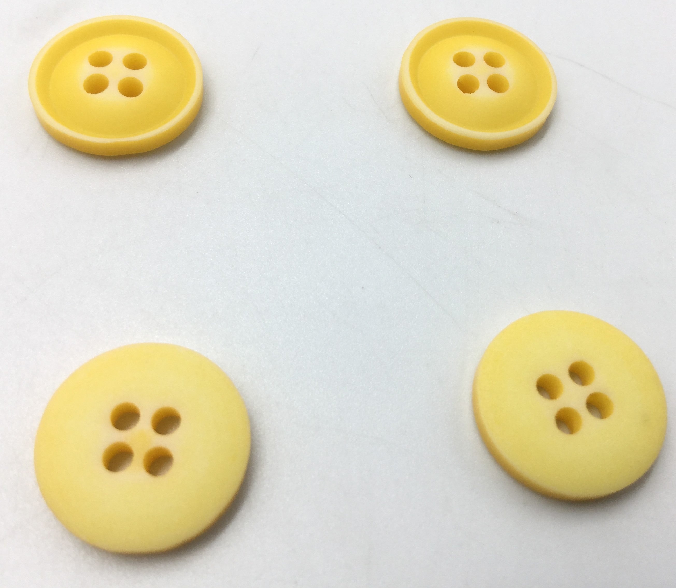 Yellow Circular 4 Hole Plastic Buttons