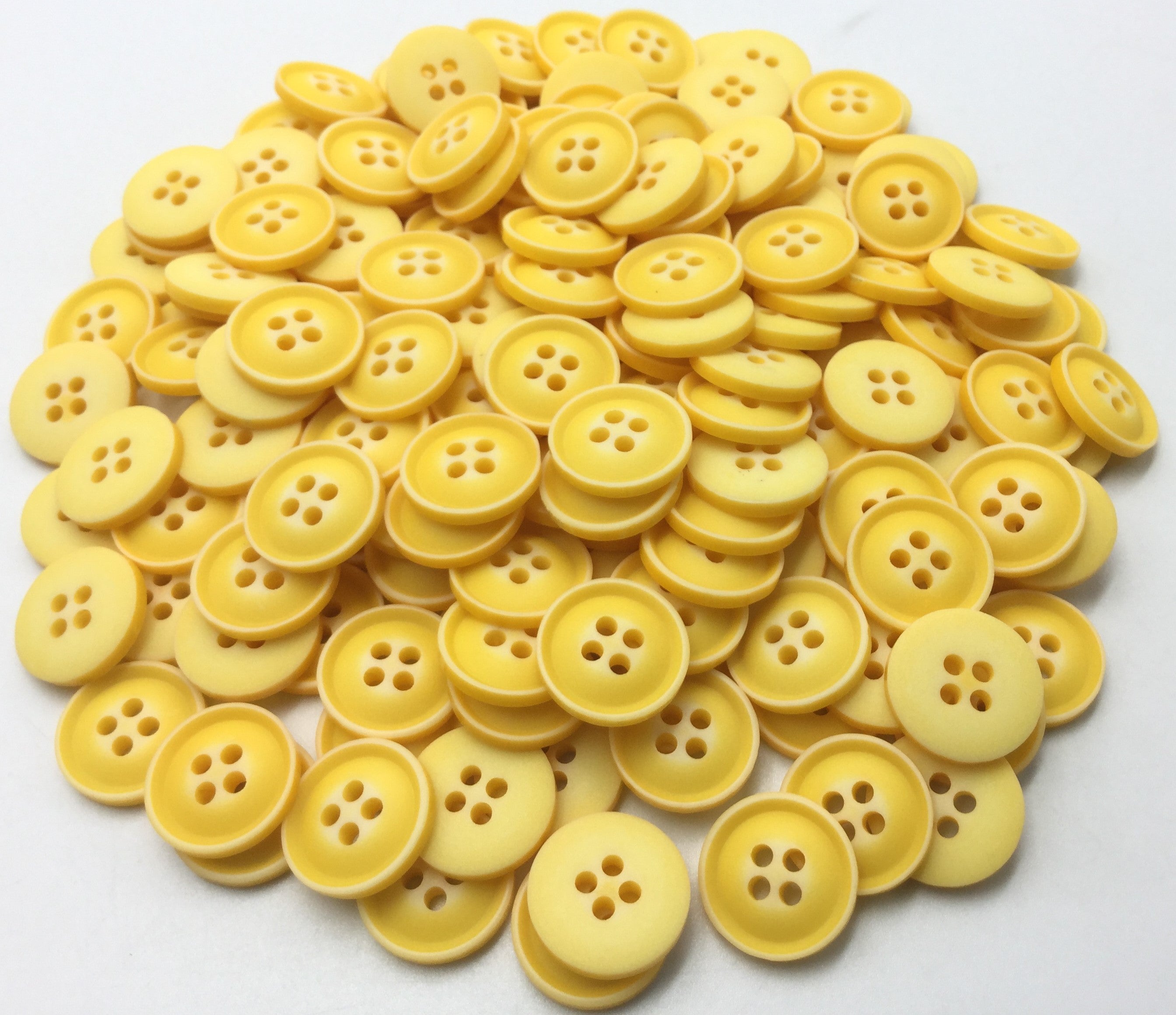 Yellow Circular Plastic Buttons