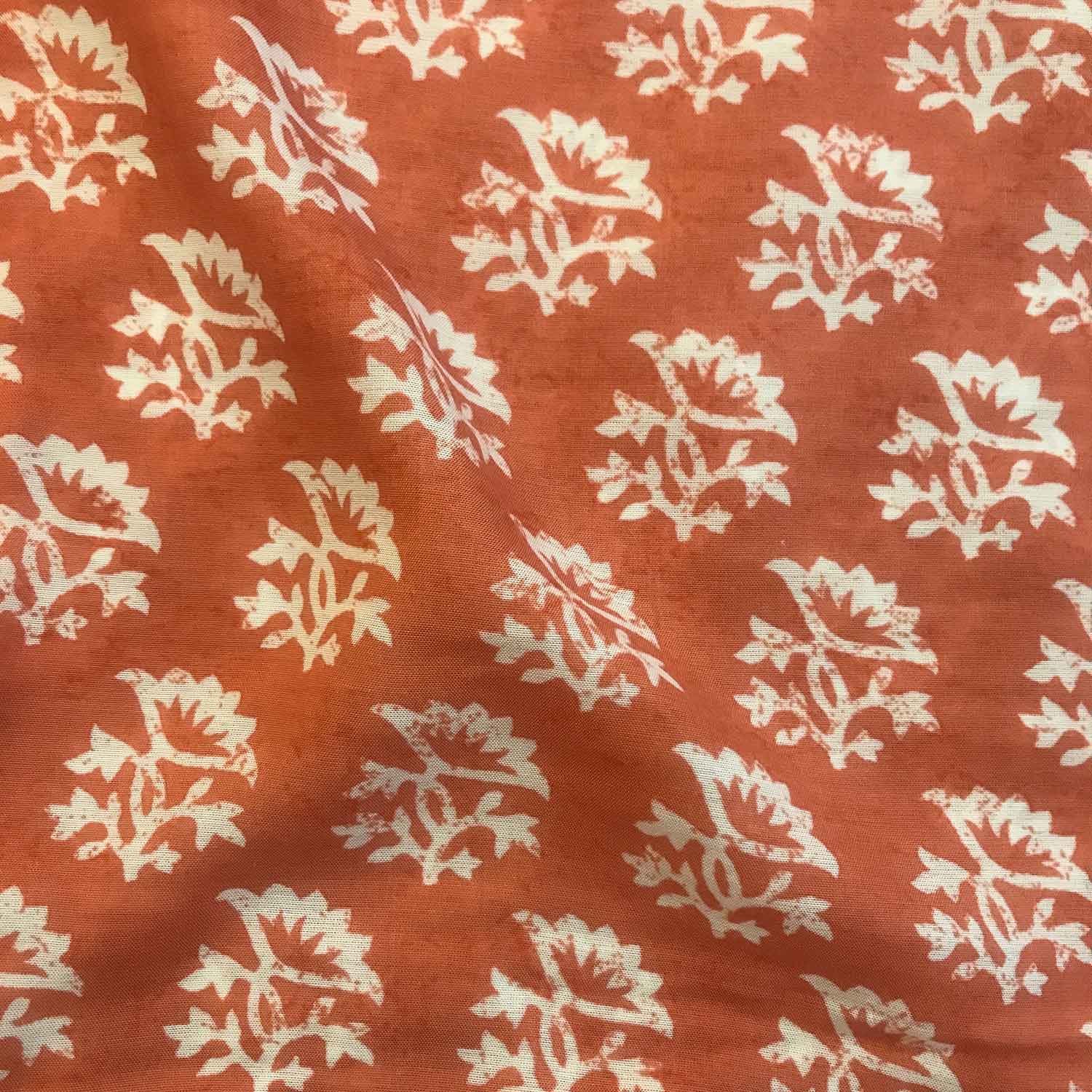 White Motif Rust Orange Viscose Muslin Fabric